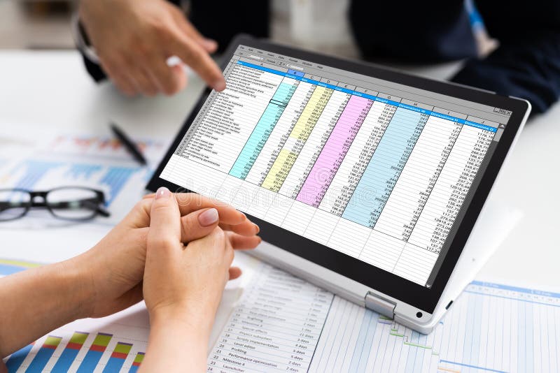 Analyst Employee Working on Spreadsheet Stock Photo - Image of people ... Analyst Employee Working on Spreadsheet Stock Photo - Image of people ...