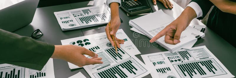 Analyst Team Analyzing Business Data Paper on Office Table. Prodigy ...