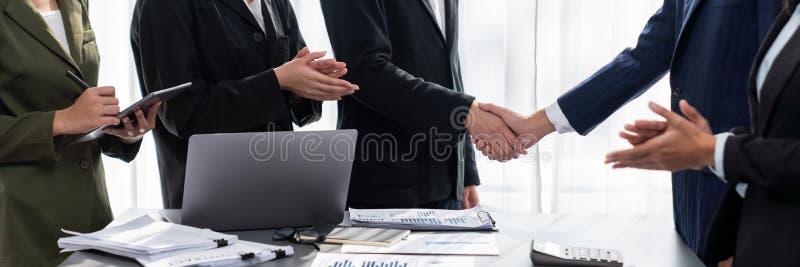 Analyst Team Celebrates Successful Data Analysis with Handshake ...