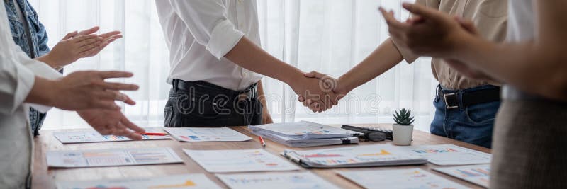 Analyst Team Celebrates Successful Data Analysis with Handshake ...