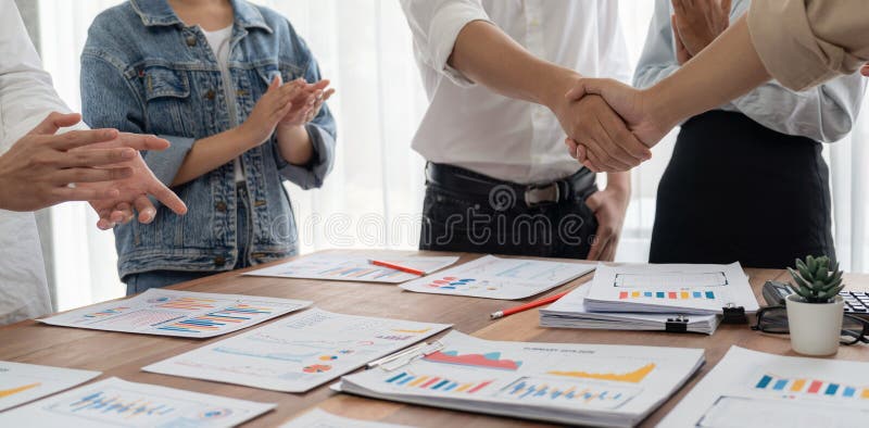 Analyst Team Celebrates Successful Data Analysis with Handshake ...