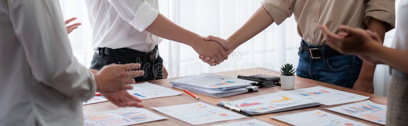 Analyst Team Celebrates Successful Data Analysis with Handshake ...