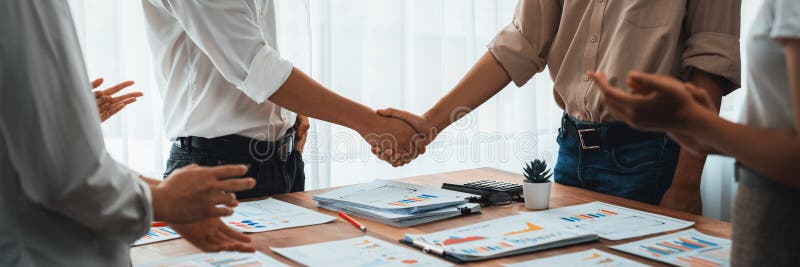 Analyst Team Celebrates Successful Data Analysis with Handshake ...