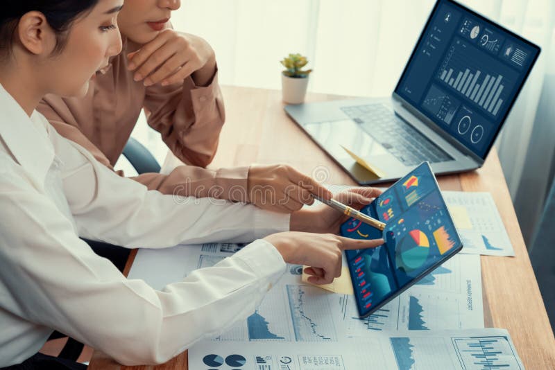 Analyst Team Colleague Discuss Financial Data on Digital Dashboard ...