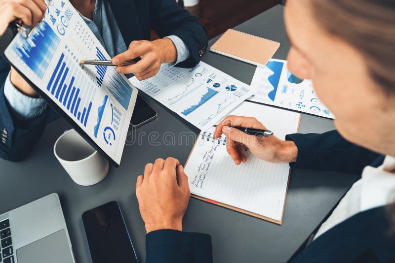 Analyst Team in Office Analyzing Financial Data Analysis Papers. Entity ...