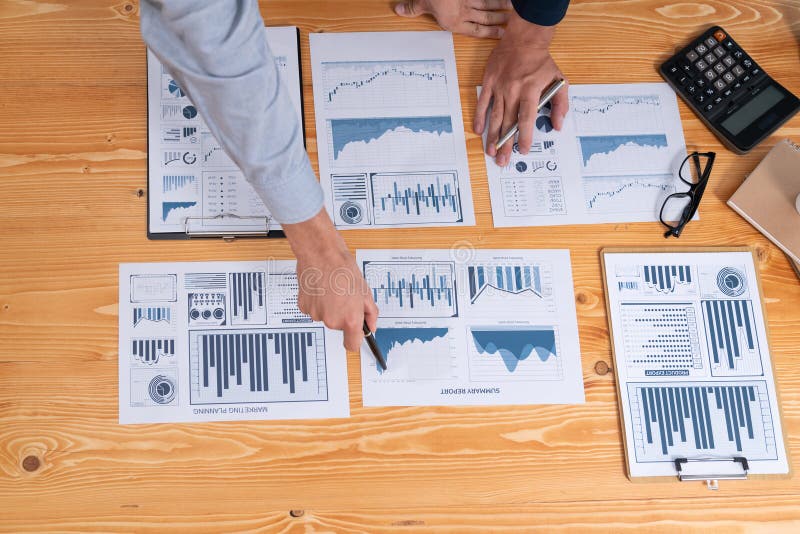 Analyst Team in Office Analyzing Financial Data Analysis Papers. Entity ...