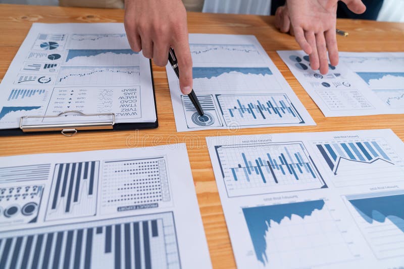 Analyst Team in Office Analyzing Financial Data Analysis Papers. Entity ...