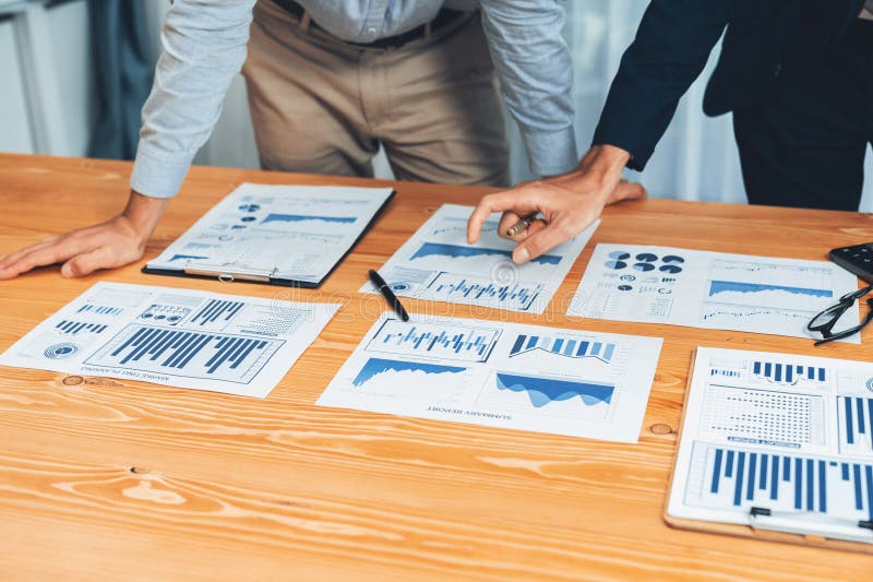 Analyst Team in Office Analyzing Financial Data Analysis Papers. Entity ...