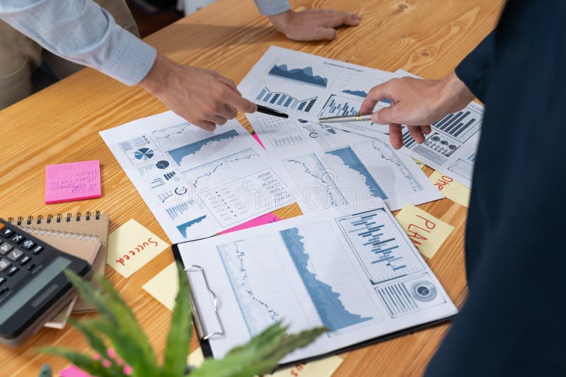 Analyst Team in Office Analyzing Financial Data Analysis Papers. Entity ...