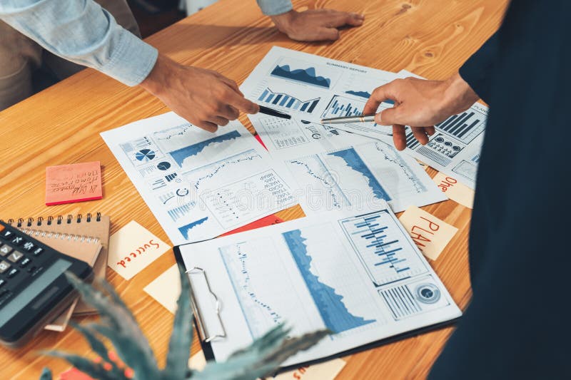 Analyst Team in Office Analyzing Financial Data Analysis Papers. Entity ...