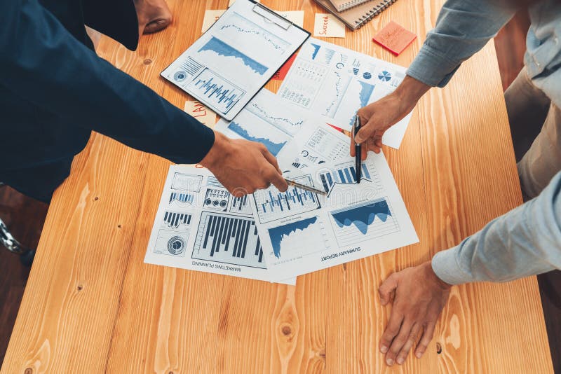 Analyst Team in Office Analyzing Financial Data Analysis Papers. Entity ...