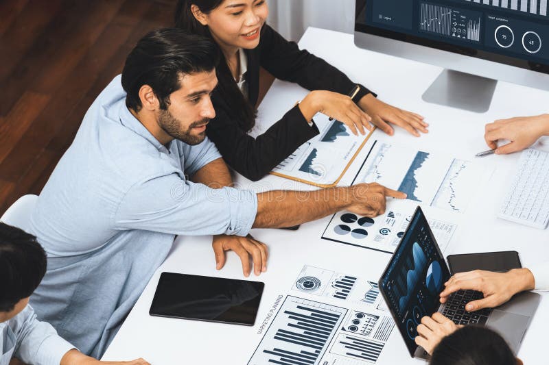 Analyst Team Utilizing BI Fintech To Analyze Financial Data at Table ...