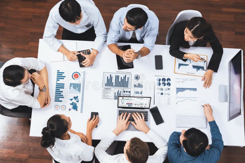 Analyst Team Utilizing BI Fintech To Analyze Financial Data at Table ...