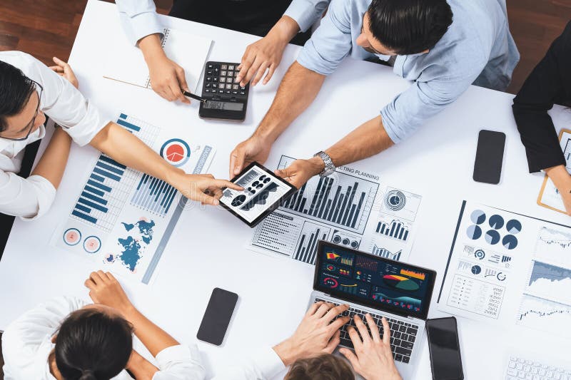 Analyst Team Utilizing BI Fintech To Analyze Financial Data at Table ...