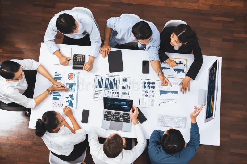 Analyst Team Utilizing BI Fintech To Analyze Financial Data at Table ...