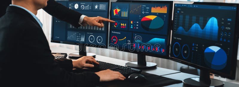Analyst Working on BI Dashboard on Computer Monitor. Trailblazing Stock ...