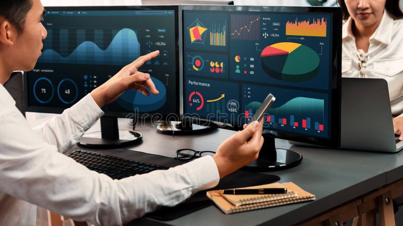 Analyst Working on BI Dashboard on Computer Monitor. Trailblazing Stock ...