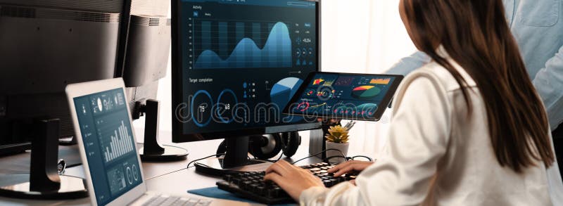 Analyst Working on BI Dashboard on Computer Monitor. Trailblazing Stock ...
