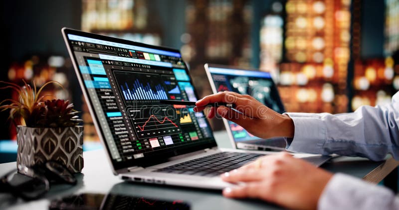 Analyst Working with Multiple Monitors in Modern Office Stock Photo ...