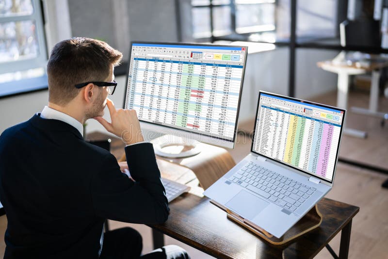 Analyst Working with Spreadsheet Business Data Stock Photo - Image of ...