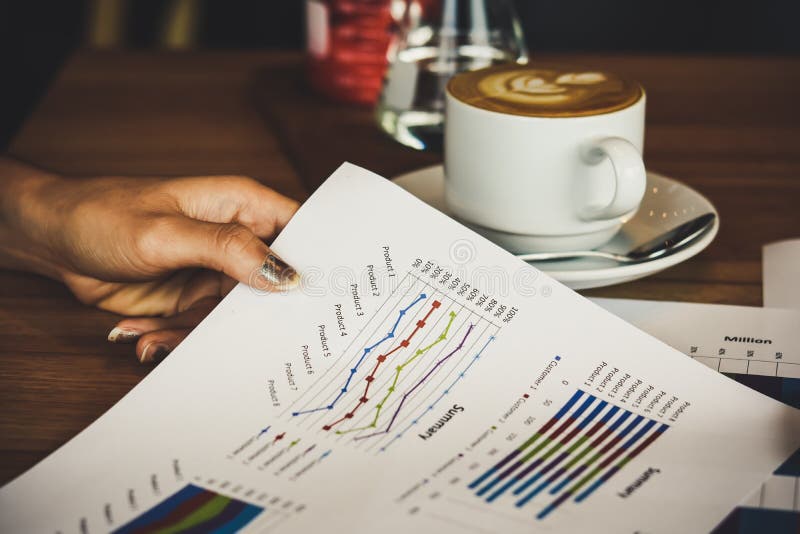 Analyze Graphs in Cafes Concept. Stock Photo - Image of coffee, finance ...