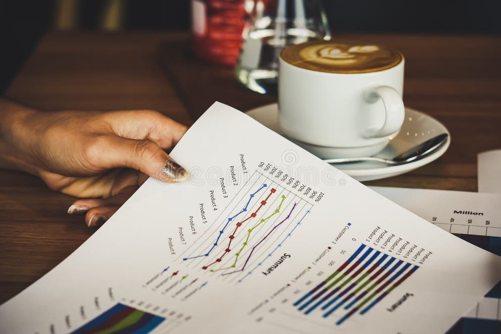 Analyze Graphs in Cafes Concept. Stock Photo - Image of coffee, finance ...