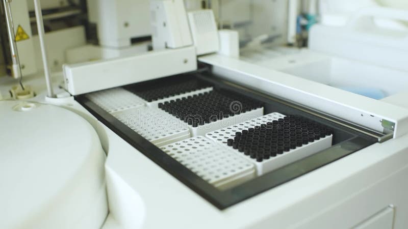 Analyzer with Containers with Test Tubes in Close-up in a PCR ...