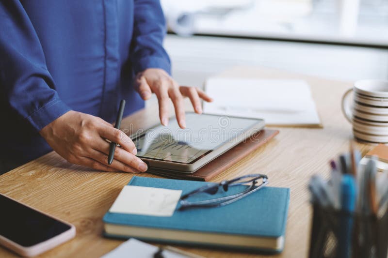 Analyzing Chart on Tablet stock image. Image of device - 295663027