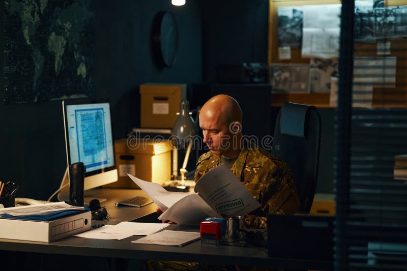 Analyzing Classified Documents in Military Office Stock Photo - Image ...