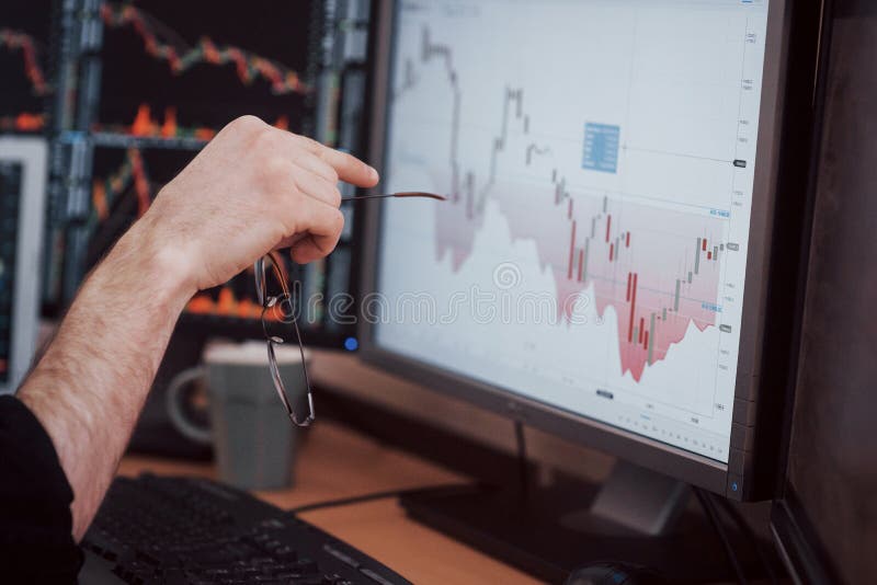 Analyzing Data. Close-up of Young Businessman Pointing on the Data ...