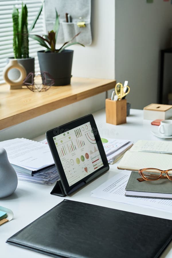 Analyzing Data on Digital Tablet on Modern Workspace Stock Image ...