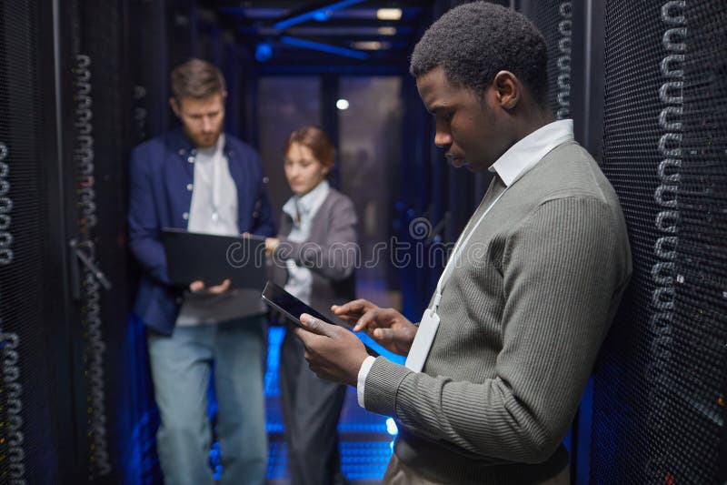 Analyzing Data Using Devices Server Room Stock Photos - Free & Royalty ...