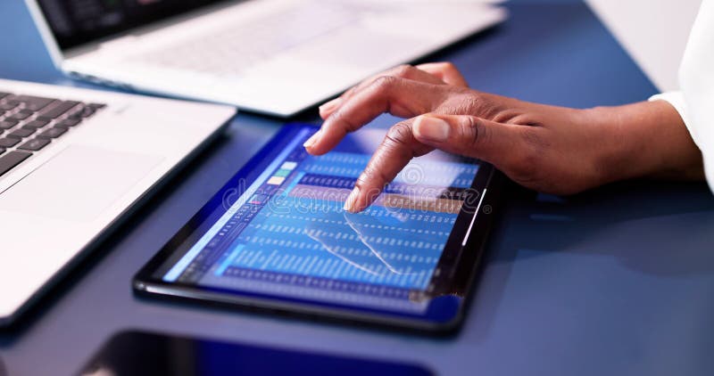 Analyzing Financial Charts on a Tablet Stock Photo - Image of reports ...