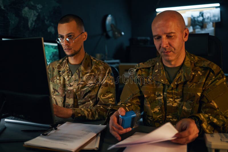 Analyzing Military Documents Command Center Stock Photos - Free ...