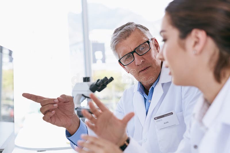 Analyzing the Recordings of Their Latest Data. Shot of Two Scientists ...