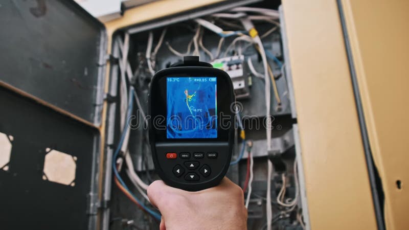 Analyzing Wiring in Electrical Panel with Thermal Scanner Stock Footage ...