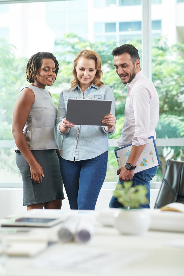 Analyzing Work Results with Colleagues Stock Image - Image of ...