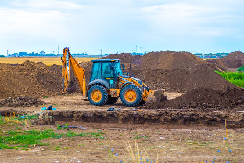Tractor at Work on the Construction of an Industrial Facility Editorial ...
