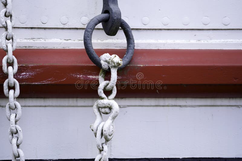 Anchor and Anchor Chain in the Harbor of a Fishing Stock Photo - Image ...