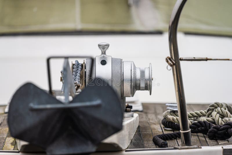 Anchor Winch Mounted on the Bow of a Boat.. Stock Photo - Image of ...
