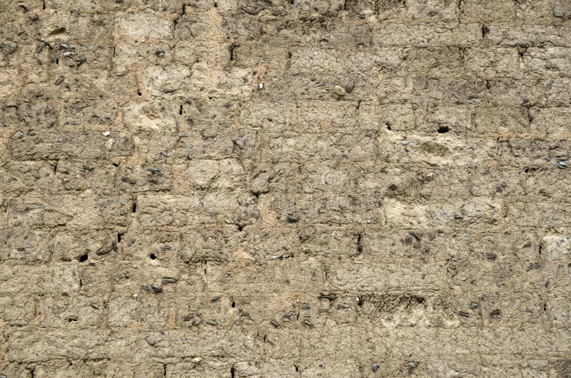 Ancient adobe wall closeup stock photo. Image of clay - 138581954
