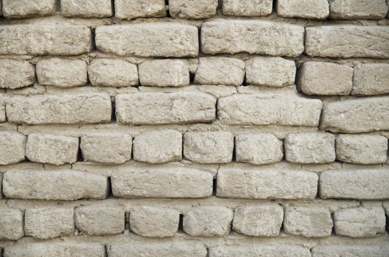 Ancient adobe wall closeup stock photo. Image of clay - 138581954
