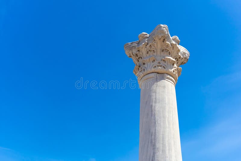 Fragment of an Ancient Antique Greek Column Against a Blue Sky with ...