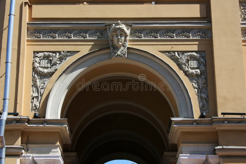 Ancient Arch with Bas-reliefs in a Stone House Stock Image - Image of ...
