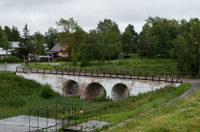 Ancient Arched Brick Bridge with Cobbled Pavement Stock Image - Image ...