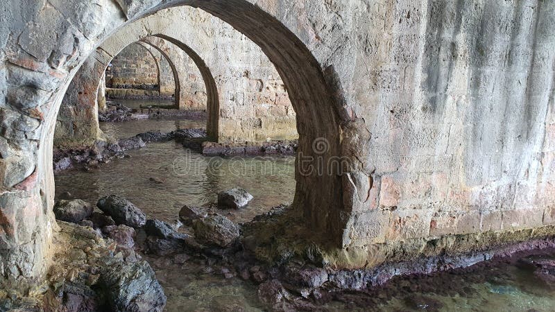 An ancient arcs on seaside stock image. Image of arch - 233405281