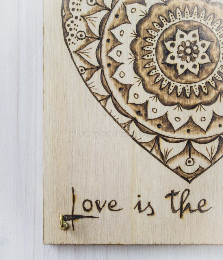 The Ancient Art of Pyrography, Wood and Fire, Mandala Stock Photo ...