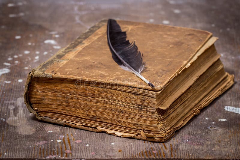 Ancient Book in a Grunge Style on a Wooden Table Stock Photo - Image of ...
