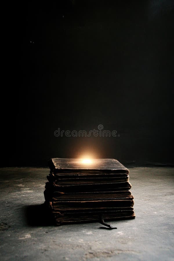 Ancient Book Stack with Mysterious Glow in Dark Room Setting Stock ...