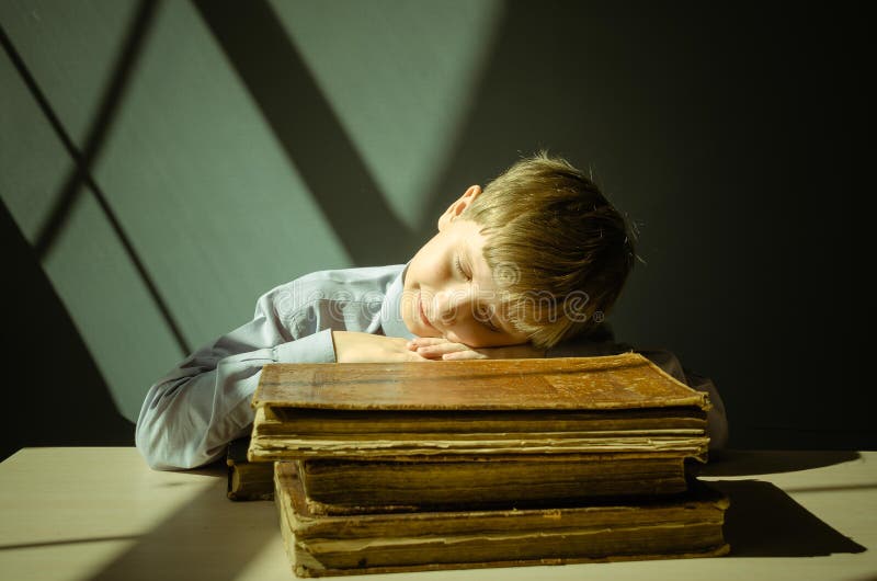 The Boy Spends Time Reading Old Books Stock Image - Image of education ...